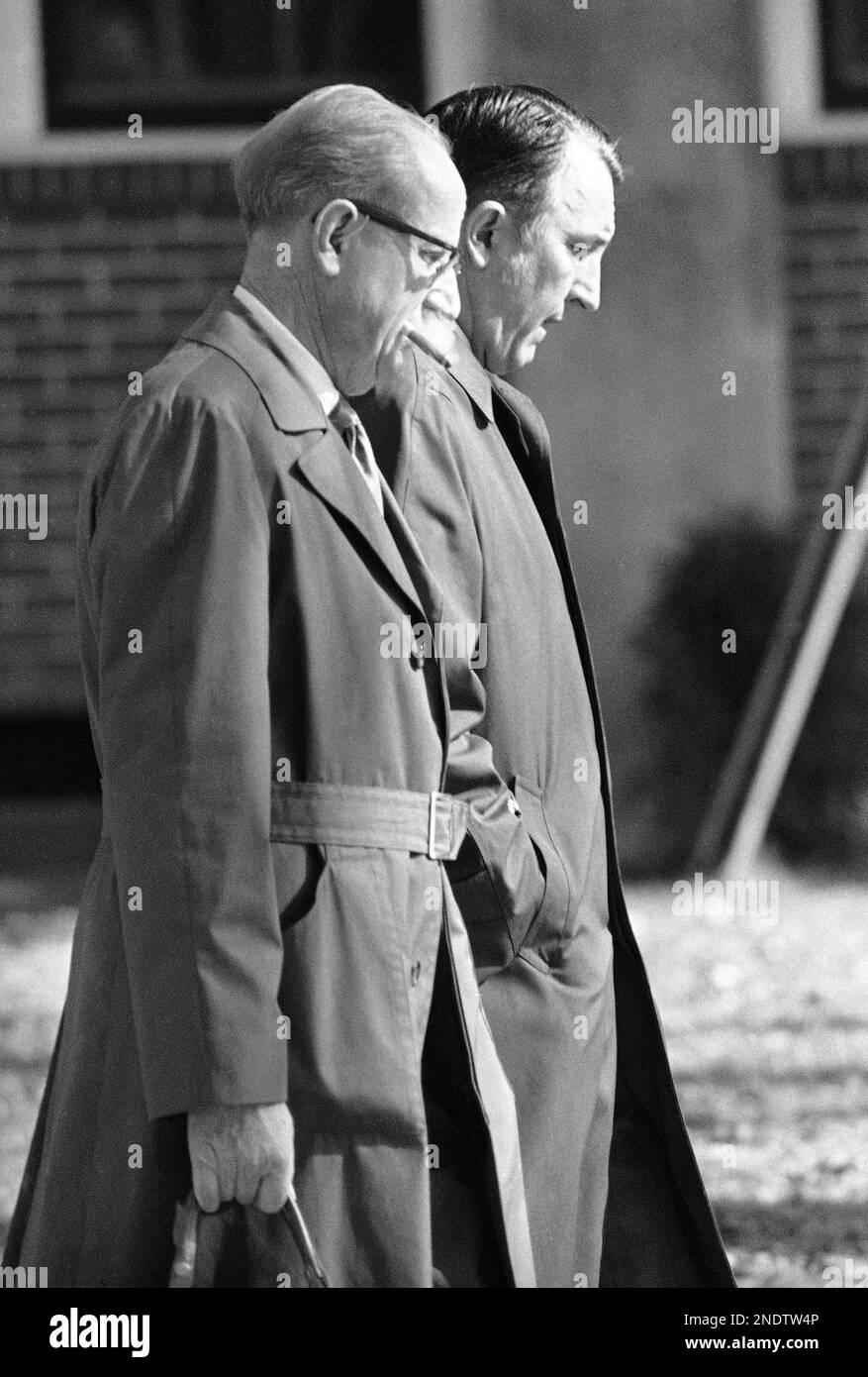 George Latimer, left, of Salt Lake City, Utah, puffs a cigar during a ...