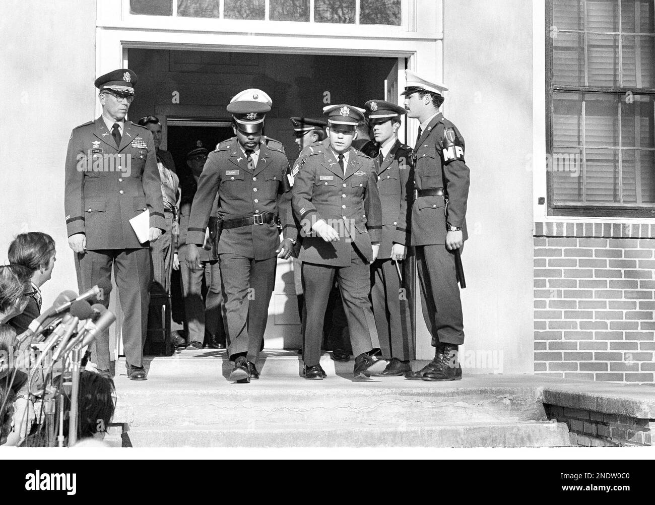 Lt. William Calley, Jr. third from right, leaves the post court ...