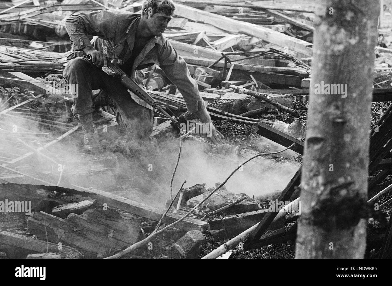 U.S. soldier of 11th Armored Regiment approaches entrance to Kva Bunker ...