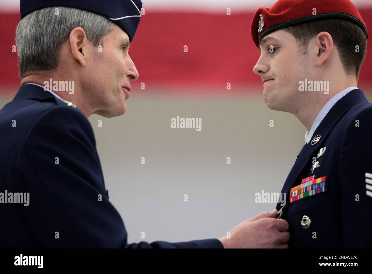 U.S. Air Force Staff Sgt. Sean Mullins, right, receives the Bronze Star ...