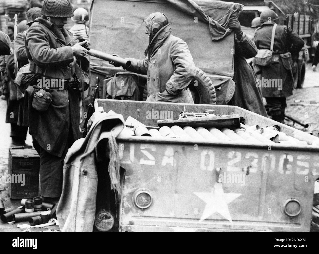 Troops of the American first army defending the Belgian town of Malmedy ...