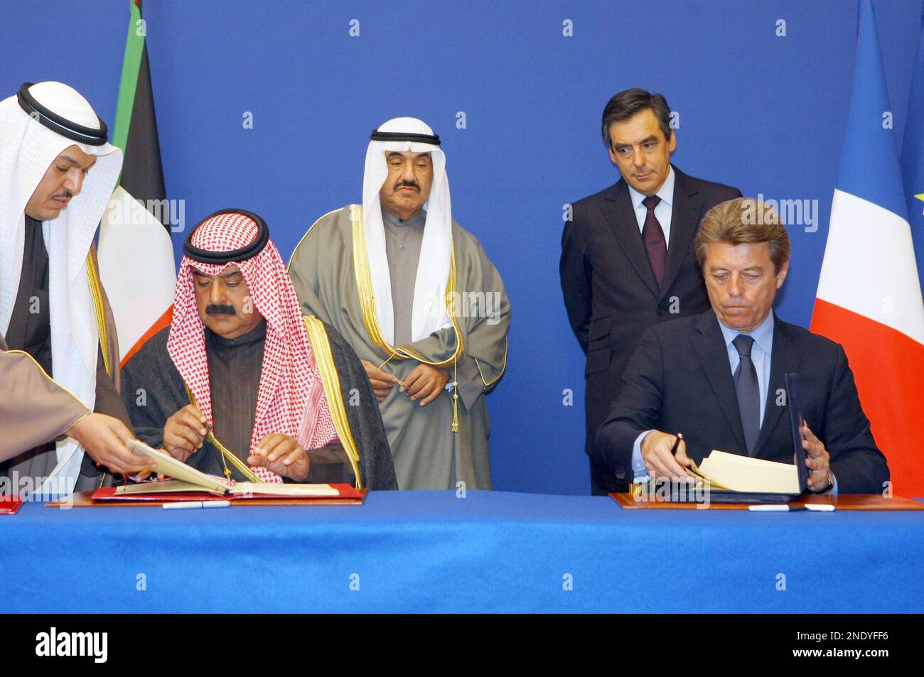 French Prime Minister Francois Fillon, second from right, watches with ...