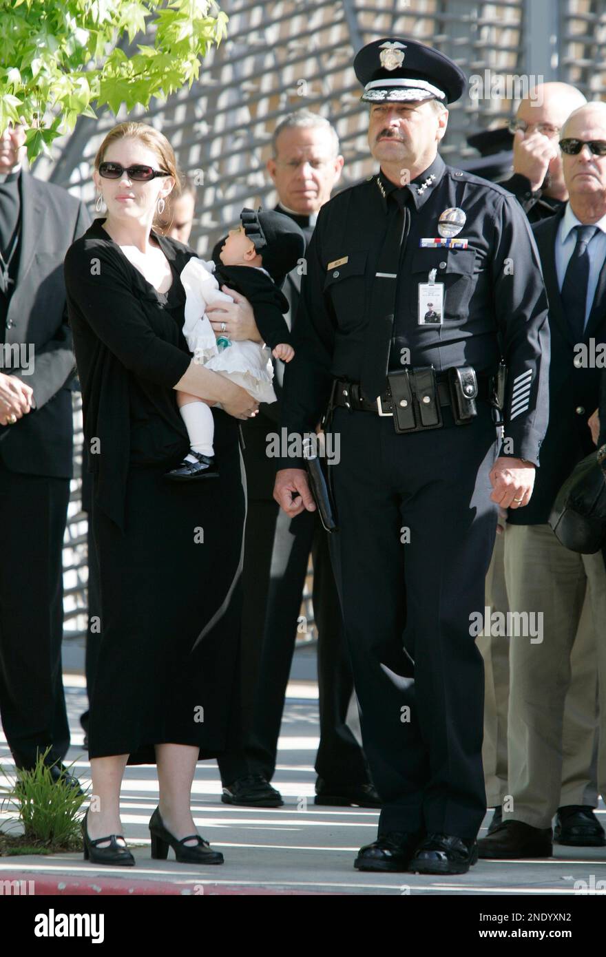 Emily Cottle, left, the widow of Los Angeles Police Department SWAT ...