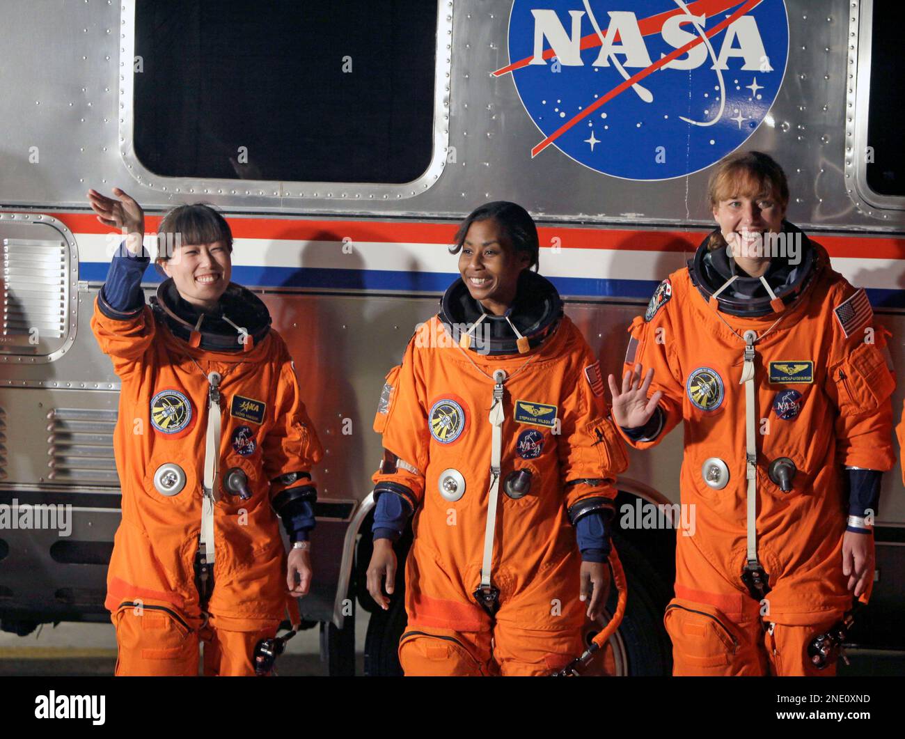 Three female astronauts of the space shuttle Discovery crew, from left ...