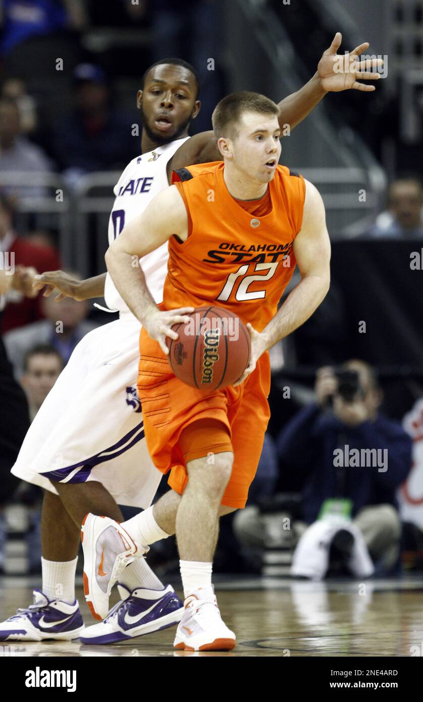 Oklahoma State guard Keiton Page looks to pass in front of Kansas State ...