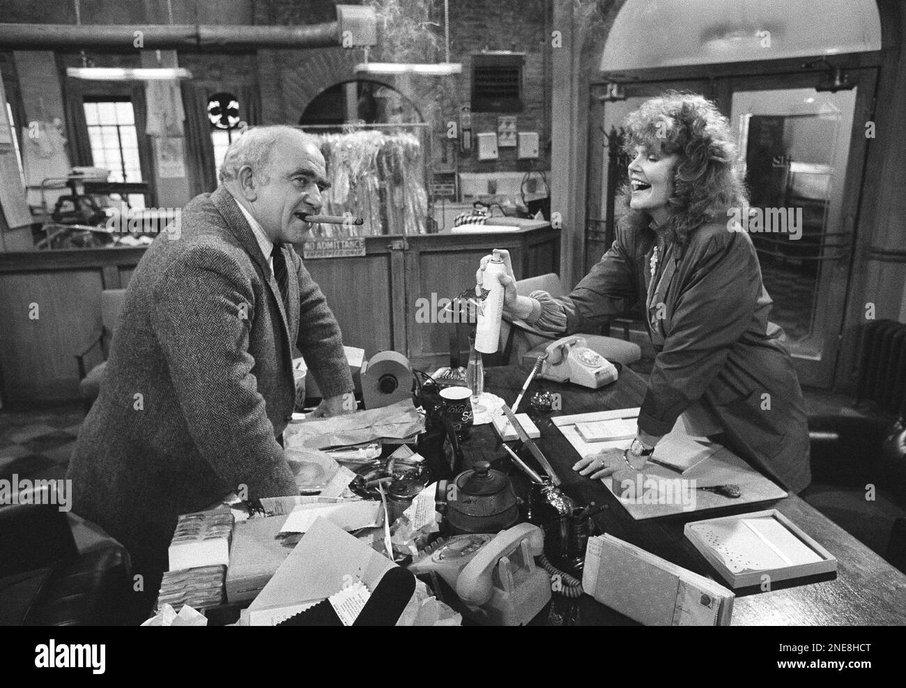 Actress Eileen Brennan and actor Ed Asner reenact a scene from their ...