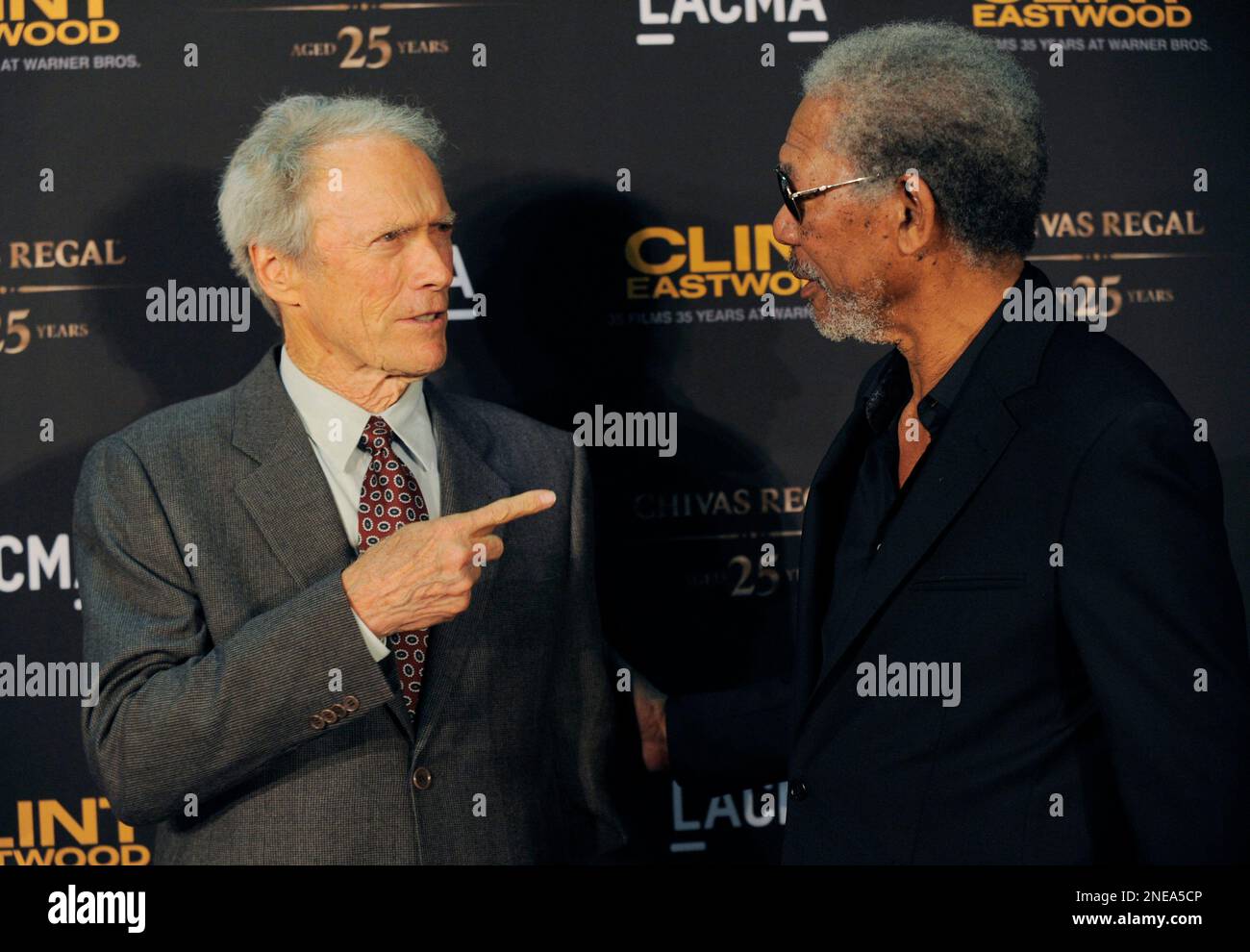 Clint Eastwood, left, chats with actor Morgan Freeman as they pose ...