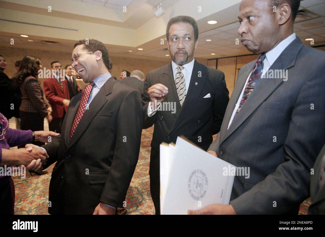 Boston lawyer Deval Patrick, left, greets a wellwisher as NAACP ...