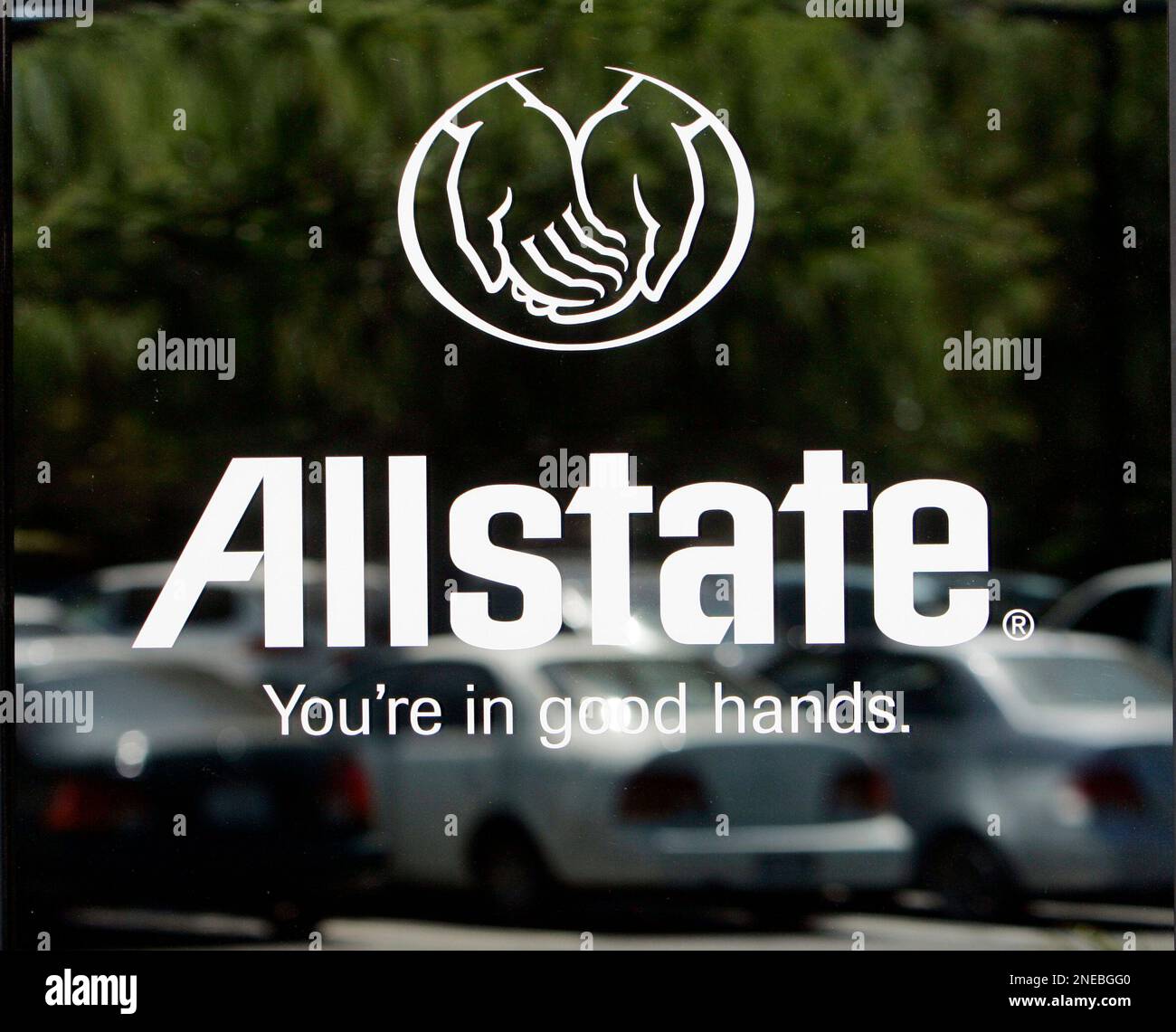 FILE - In this April 18, 2007 file photo, vehicles are reflected in the ...