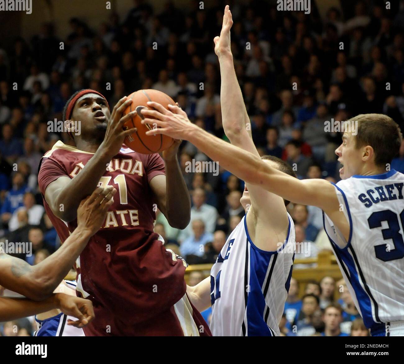 Florida State's Chris Singleton (31) drives to the basket over Duke's ...
