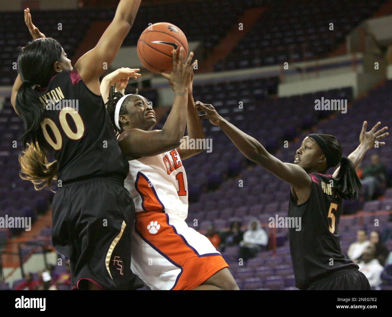 Clemson's Keyrra Gillespie (14) drives for the basket as Florida State ...