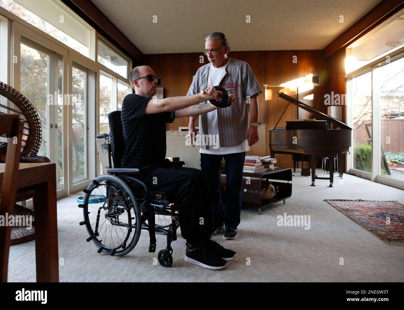 Sam Maxwell on Wednesday November 29, 2017, works physical therapy with ...