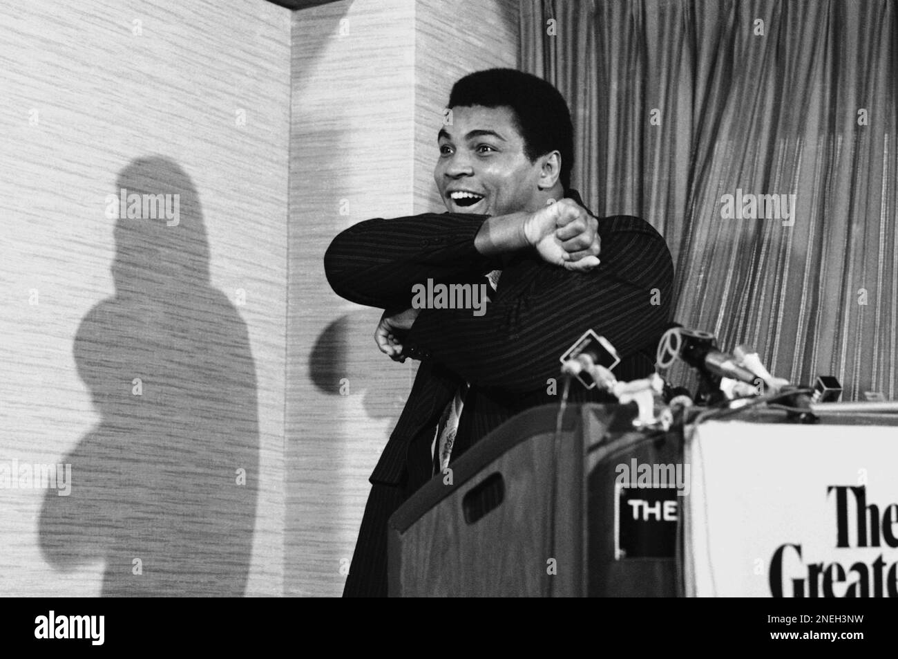 World heavyweight champion Muhammad Ali reveals a big smile as he ...