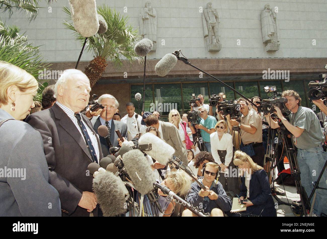 Actor Carroll O?Connor and his attorney, Lucy Inman, exchange looks ...