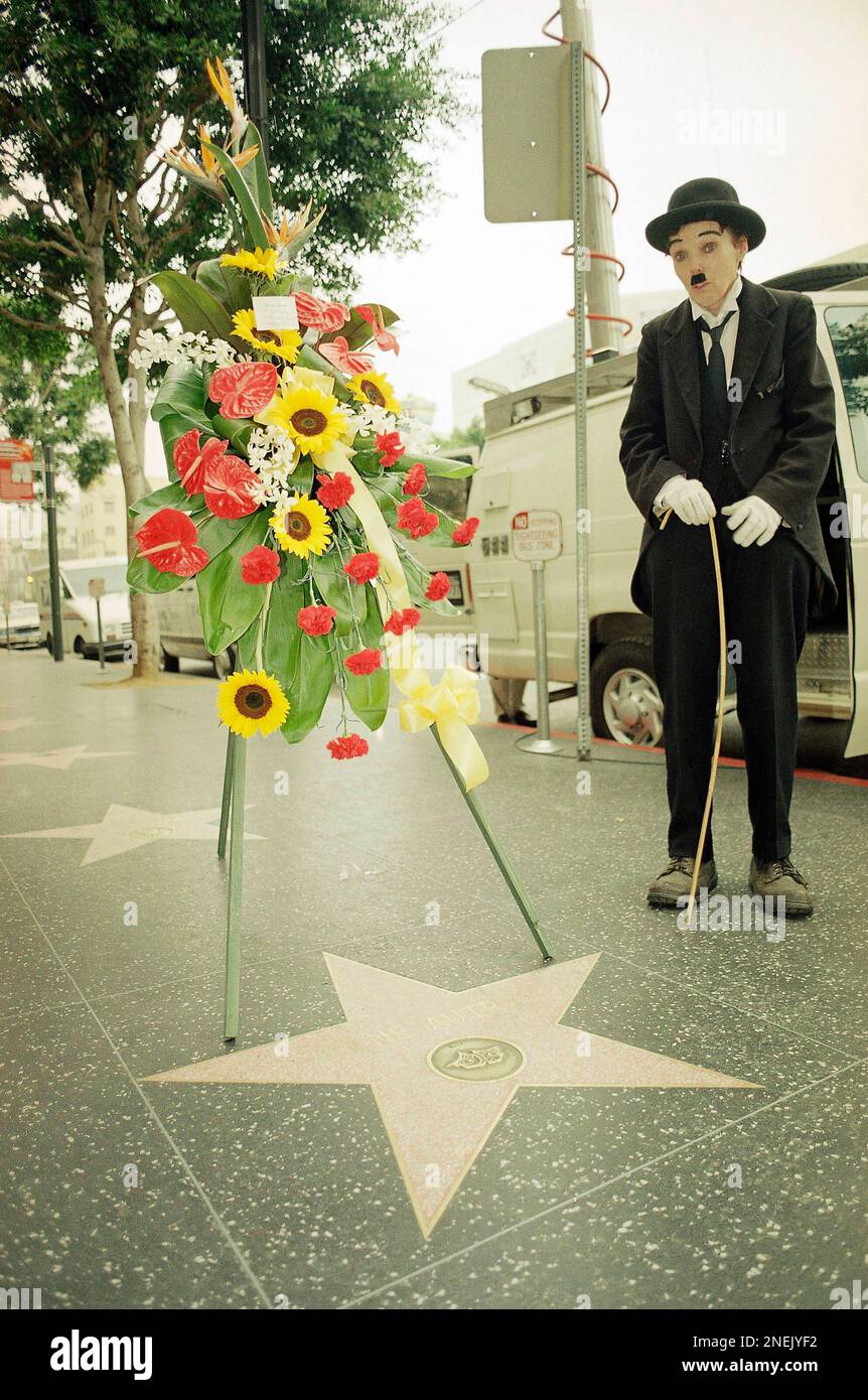 Charlie Chaplin impersonator Audrey Ruttan takes a moment at the star ...