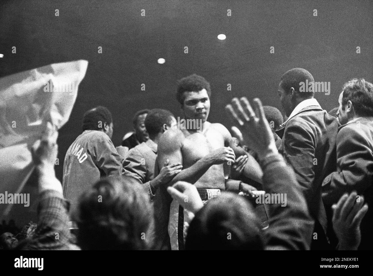 Former world heavyweight champion Cassius Clay, right, who now prefers ...