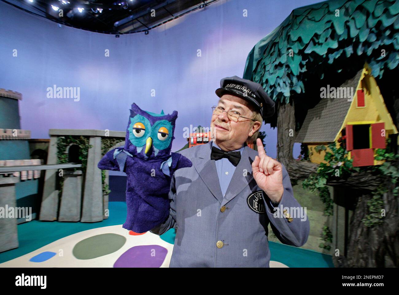 David Newell as Mr McFeely holds a replica X the Owl in the ...
