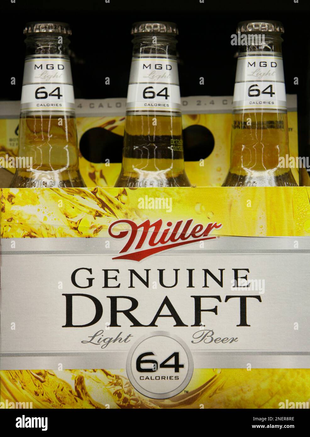 Bottles of Miller Genuine Draft 64 are seen on a shelf at a local ...