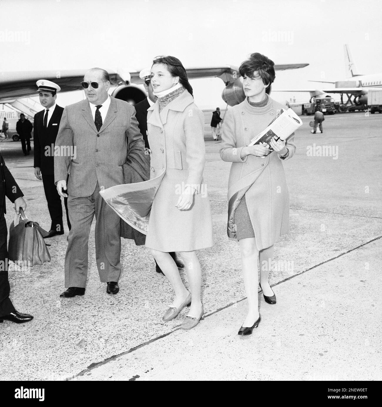 Italian director Roberto Rossellini with his twin daughters, Isabella ...