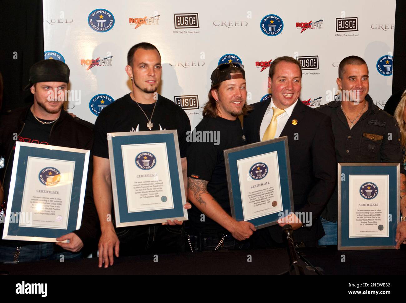 L-R Creed bassist Brian Marshall, guitarist Mark Tremonti, drummer ...