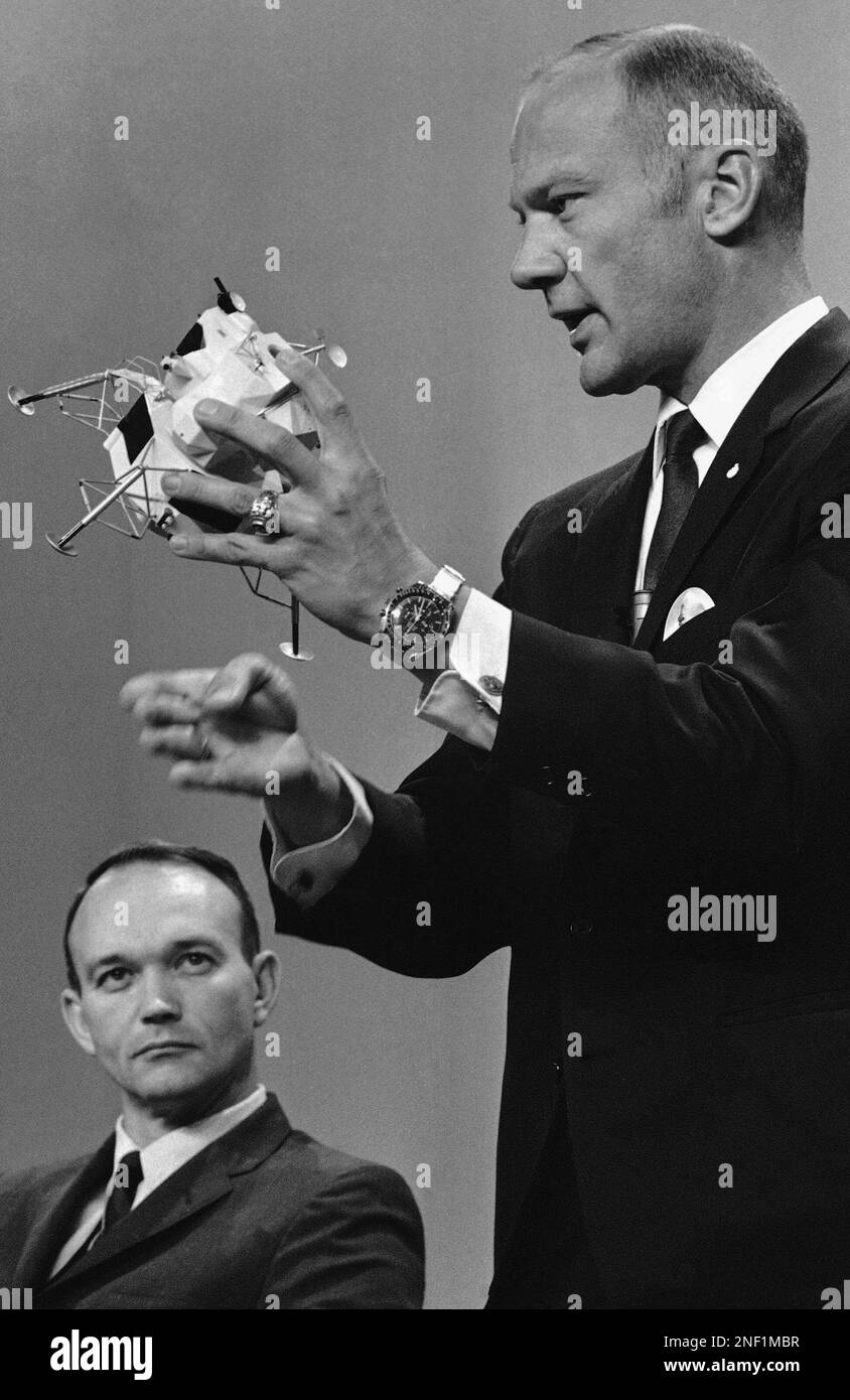 Air Force Col. Edwin Aldrin Jr., holding a model of the lunar module he ...