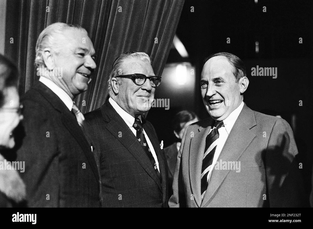 Attorney General William B. Saxbe, right, smiles as he talks with ...
