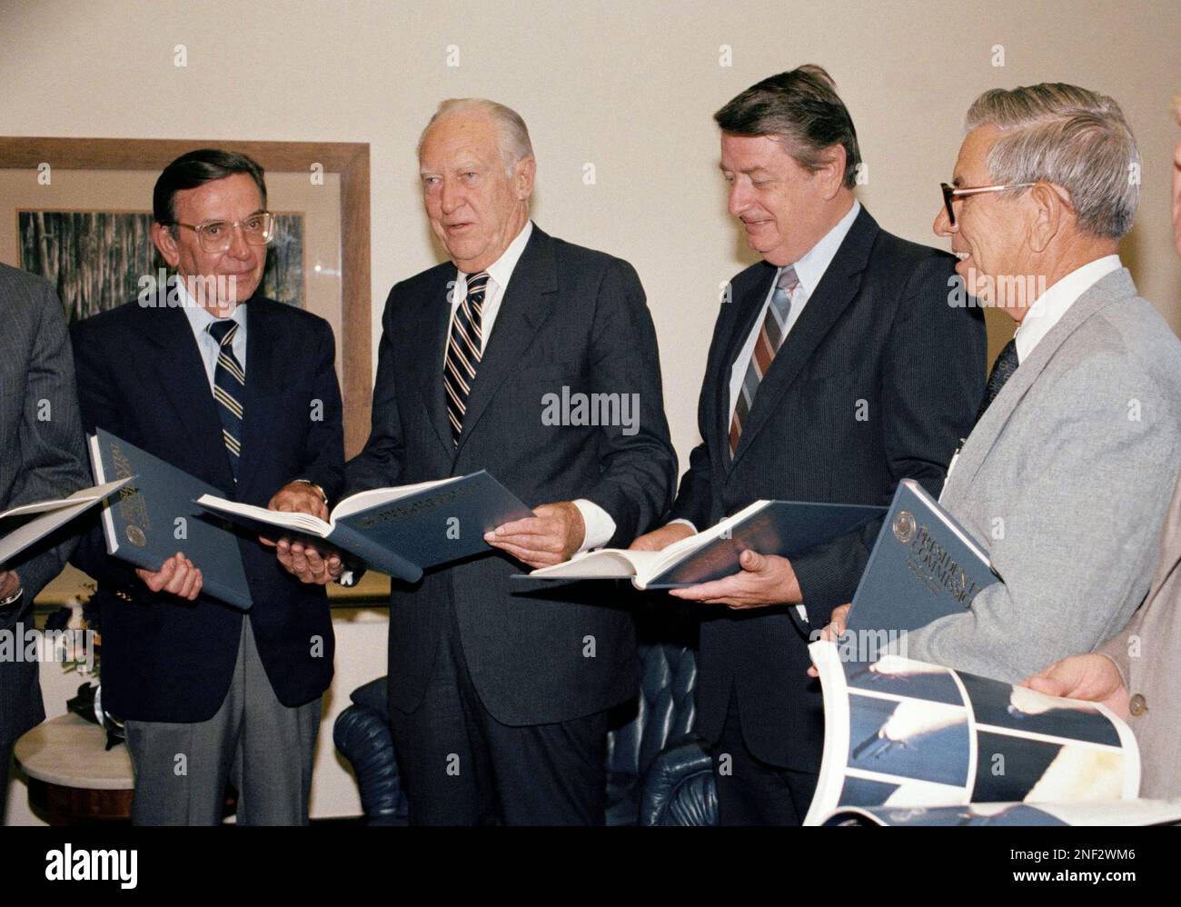 Presidential Shuttle Commission Chairman William P. Rogers, second from left, meets with members ...