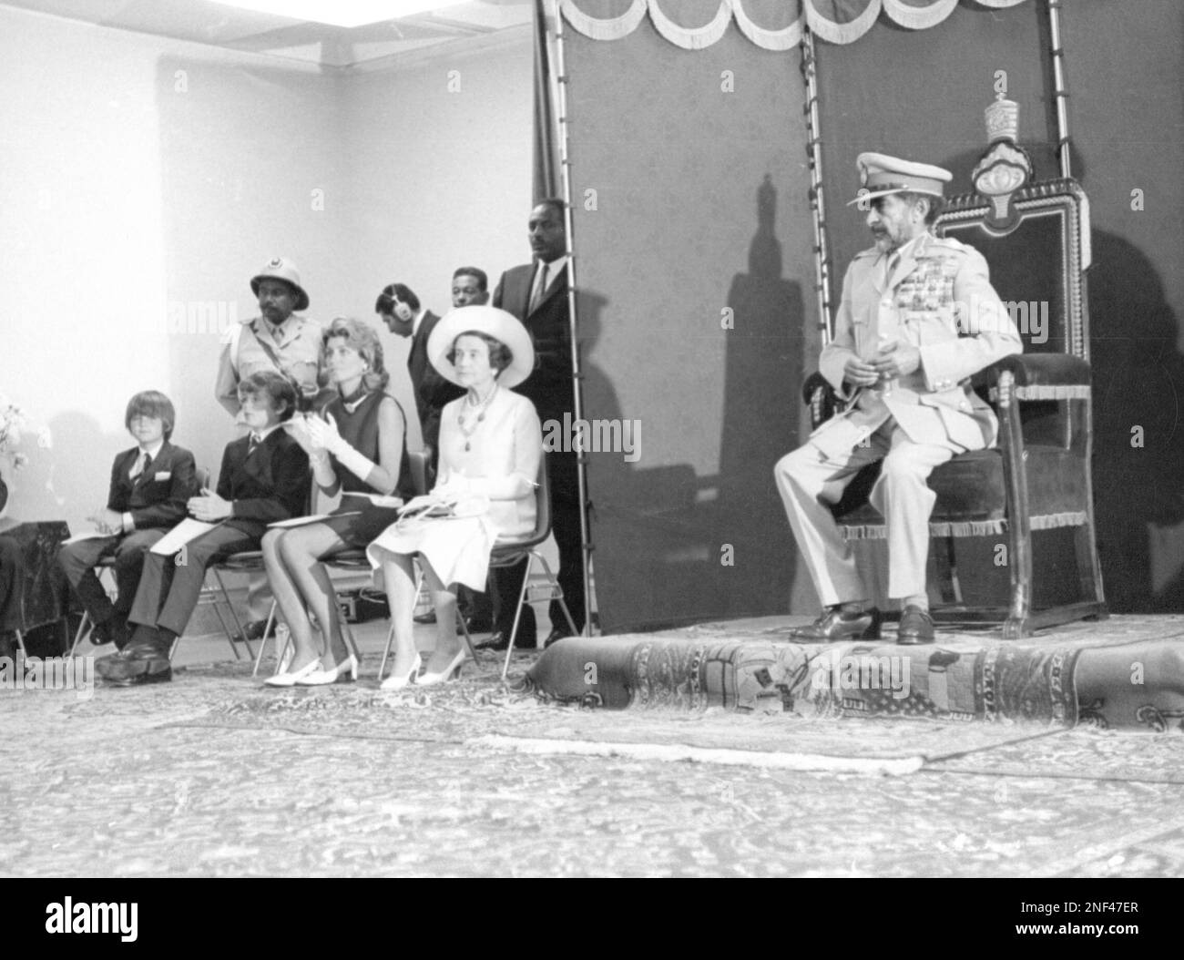 Haile Selassie, right, Emperor of Ethiopia reads his traditional ...