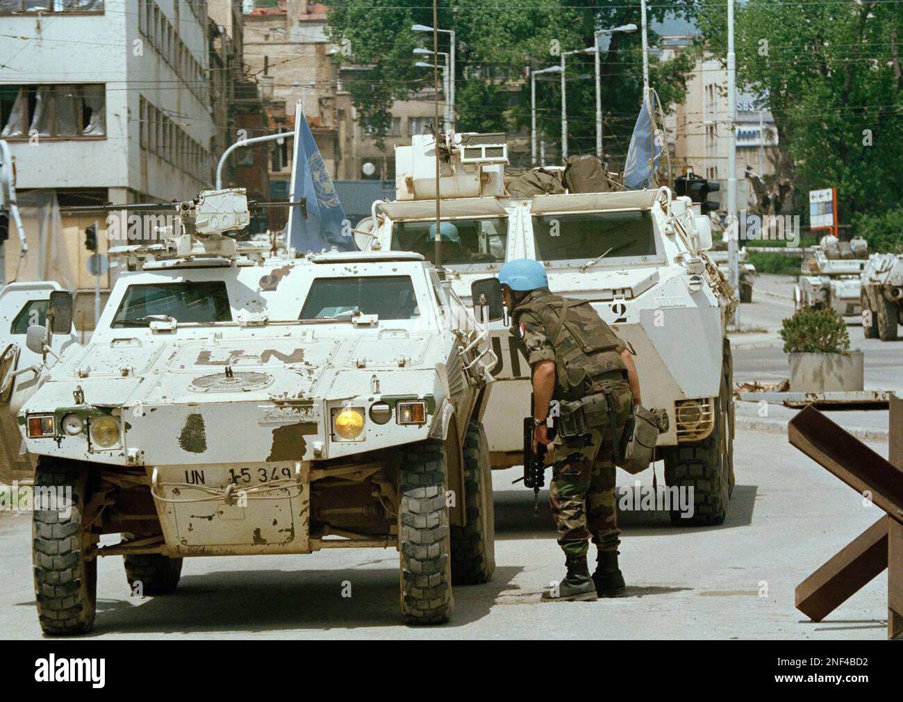 A French U.N. peacekeeper checks a French light armored vehicle before ...