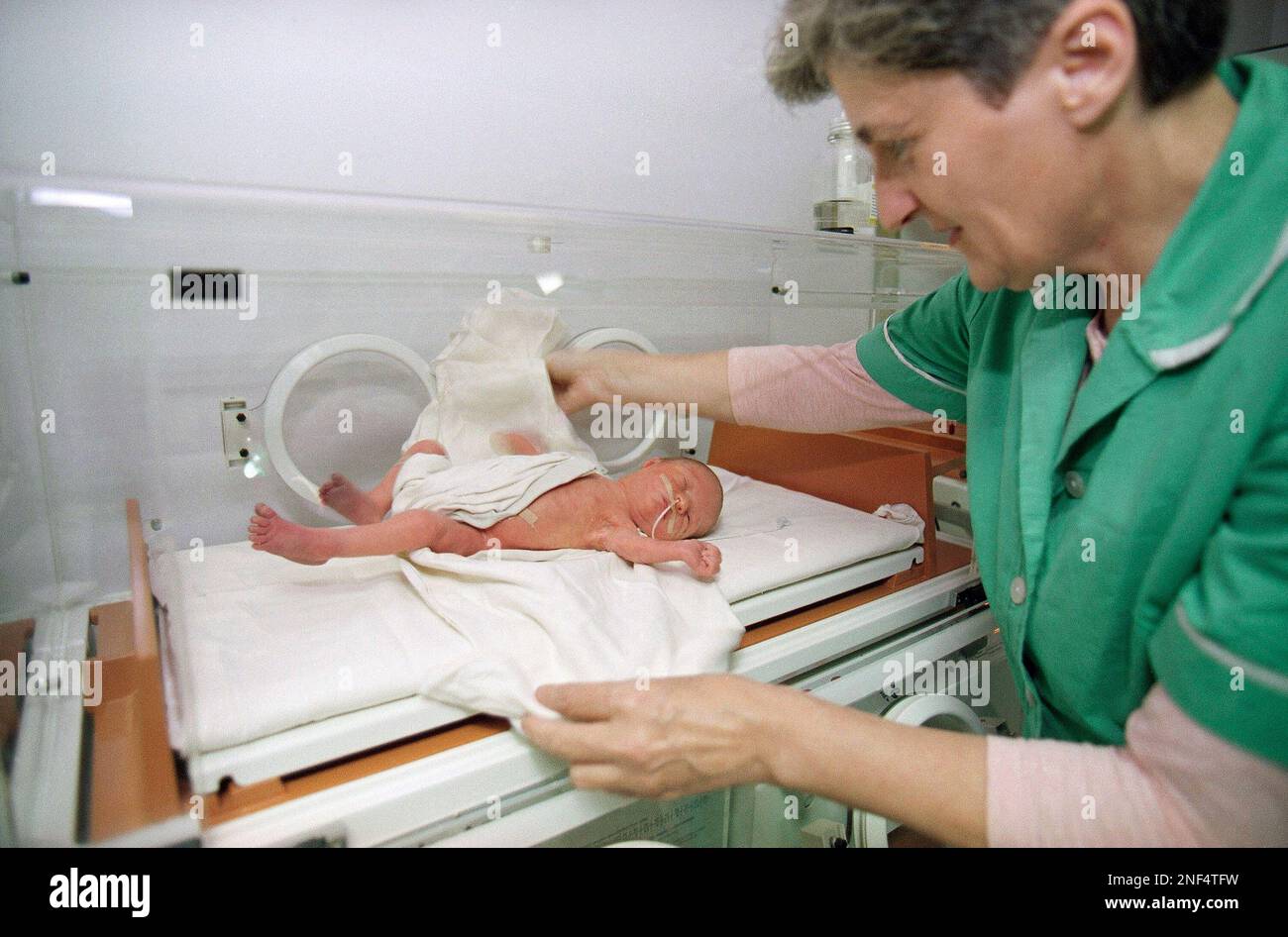 A Sarajevan nurse tends to a baby known as 01 Hadzovic at the ...