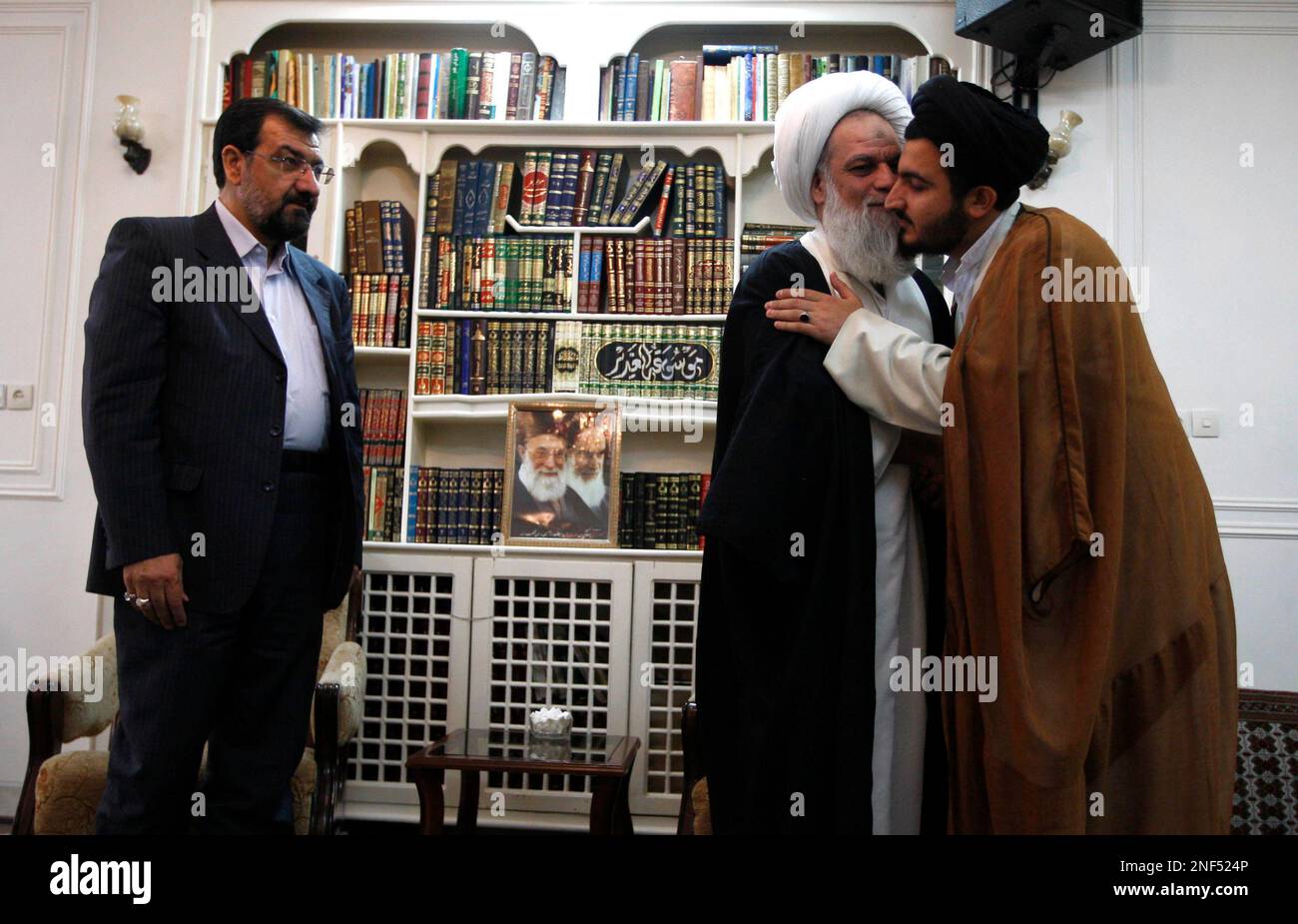 Mohsen Rezaei, left, a moderate conservative candidate in upcoming ...