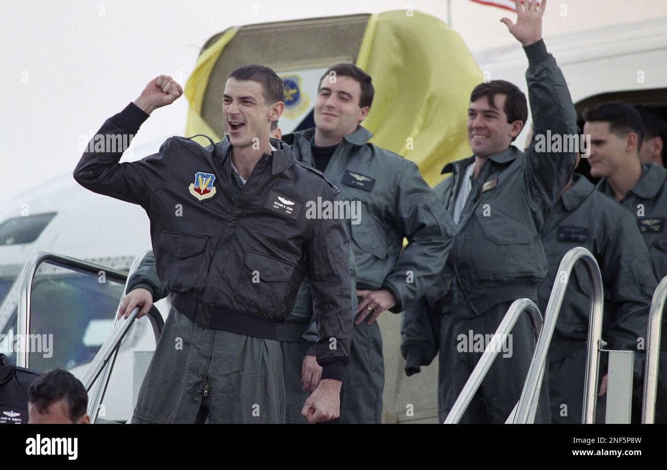 Air Force Capt. Richard Storr of Spokane, Wash., leads the way off a ...
