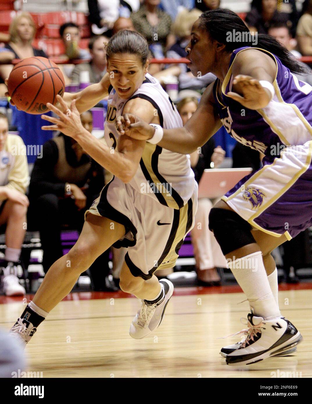 Vanderbilt guard Jennifer Risper, right, drives past Western Carolina ...