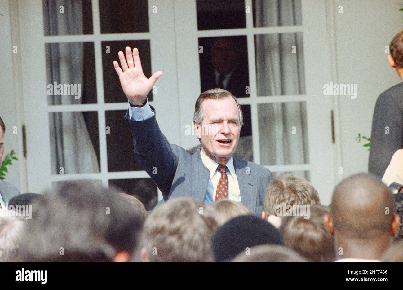U.S. President George H. Bush welcomes members of the American Legion's ...