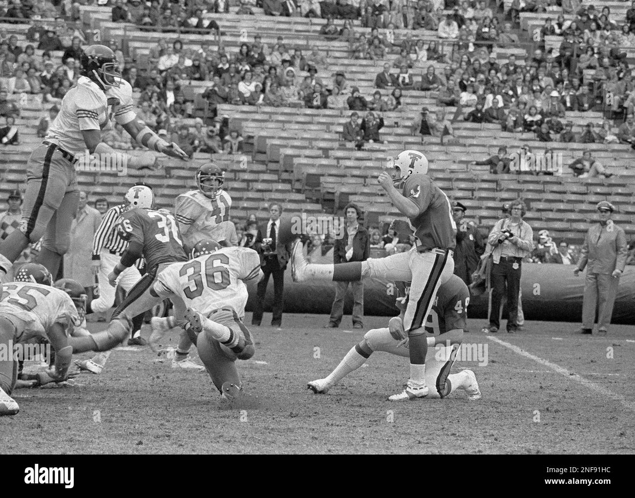 Vanderbilt tackle Dennis Harrison, left, soars high on the way to ...