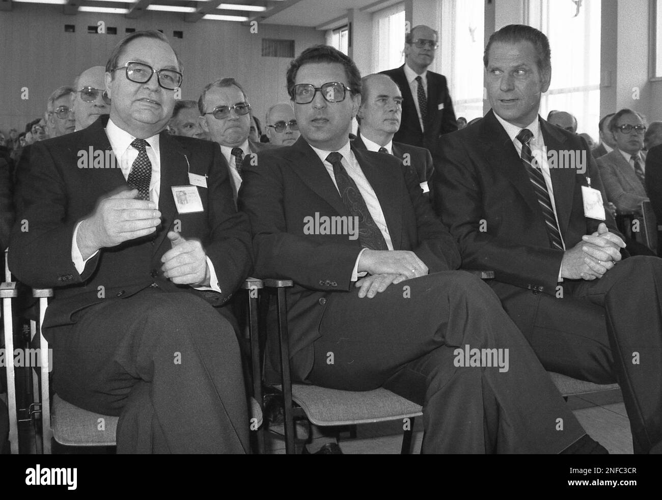 West German interior minister, Gerhart Baum, is flanked by Dr. Heinrich ...