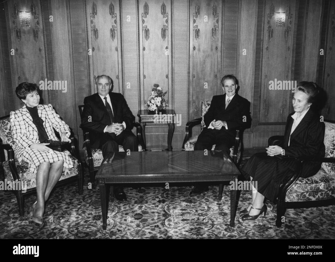 Romania's President Nicolae Ceausescu, and his wife Elena, right, sit ...