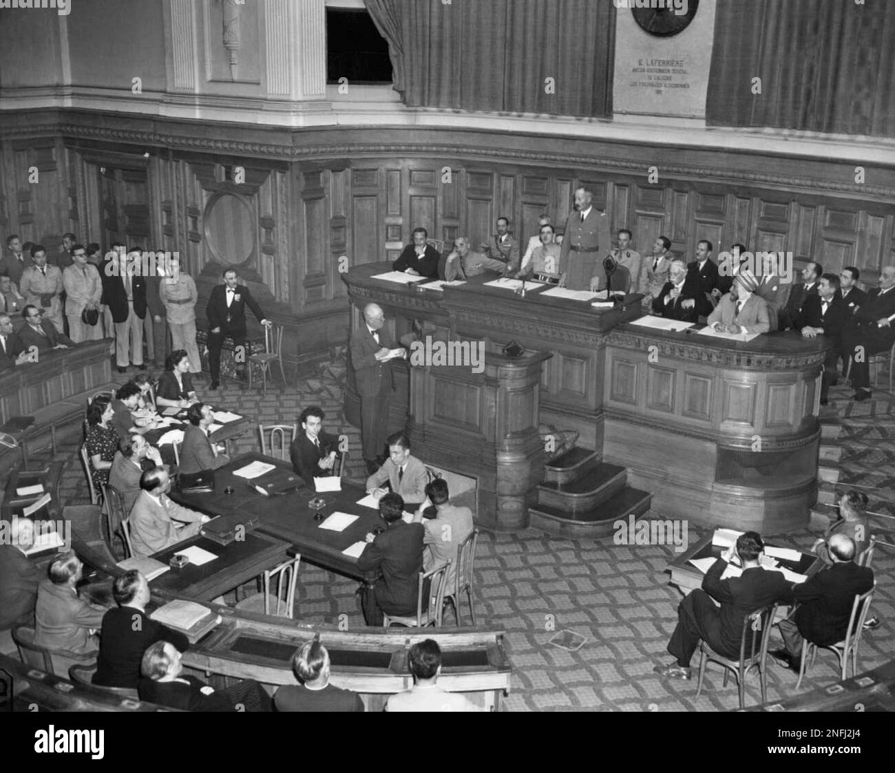 Gen. Henri Giraud (center, standing) addresses members of the Assembly ...