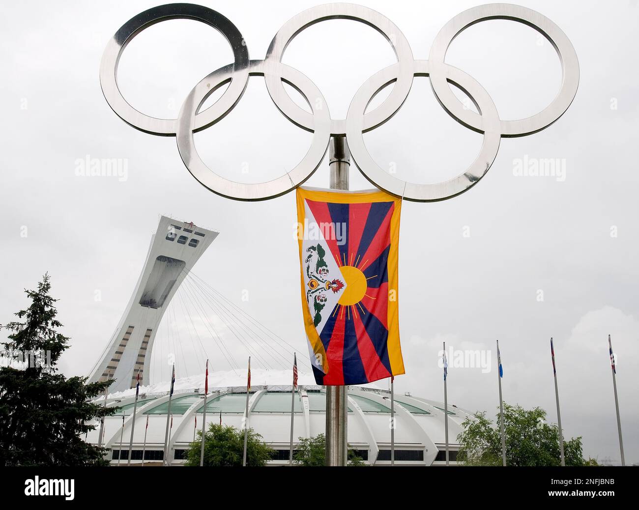 The flag of Tibet, also known as the snow lion flag, hangs on the ...