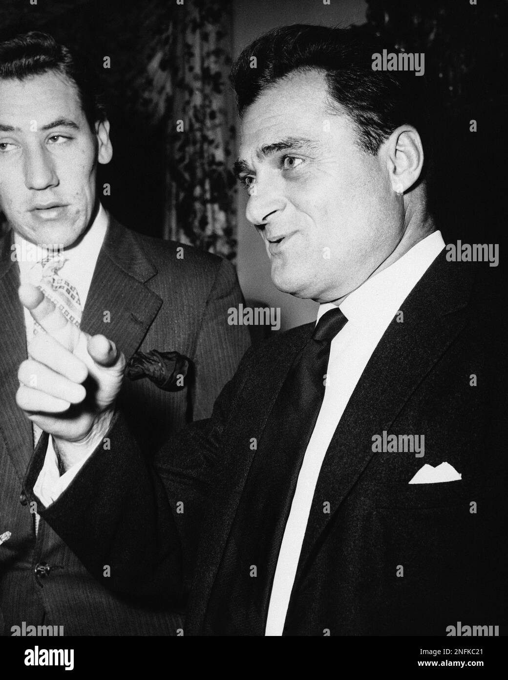 American film producer Mike Todd, right, shown at press conference in ...