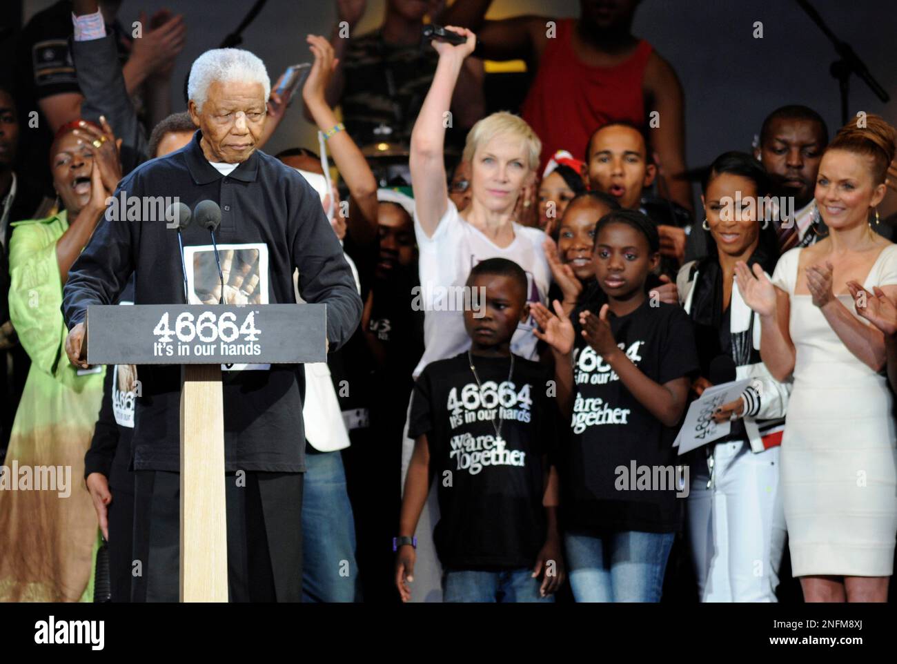Nelson Mandela, left, speaks, as from center left, British singer Annie ...