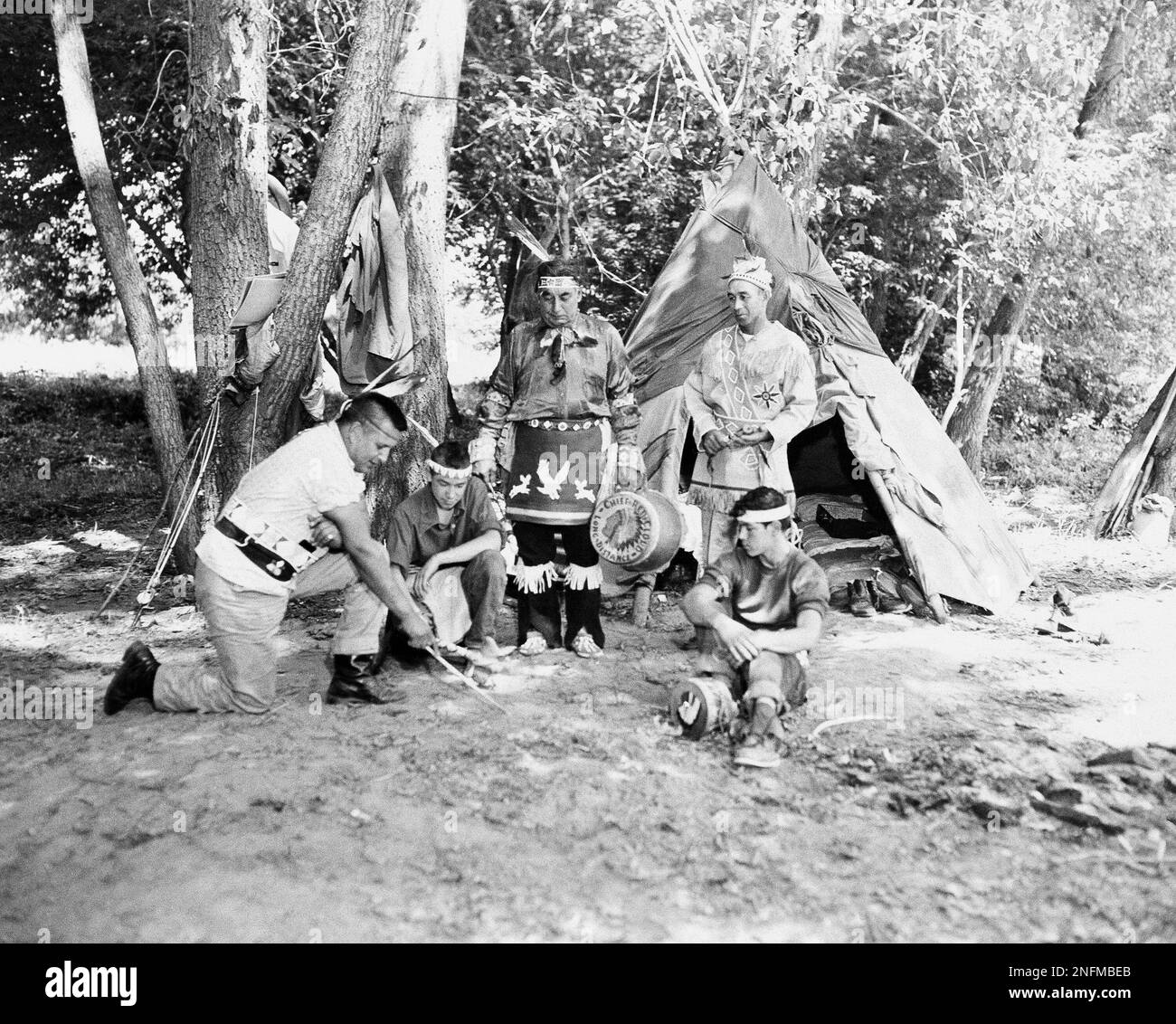 Chief Standing Arrow tells a group of Mohawks camping beside a State ...