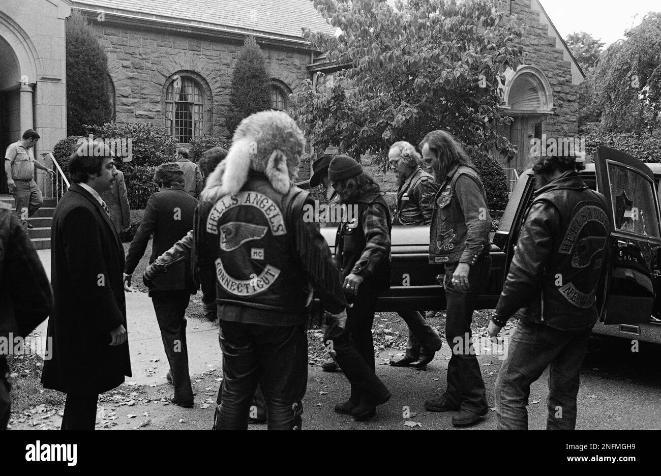 Members of the Hell's Angels Motorcycle Club carry the coffin of one of ...