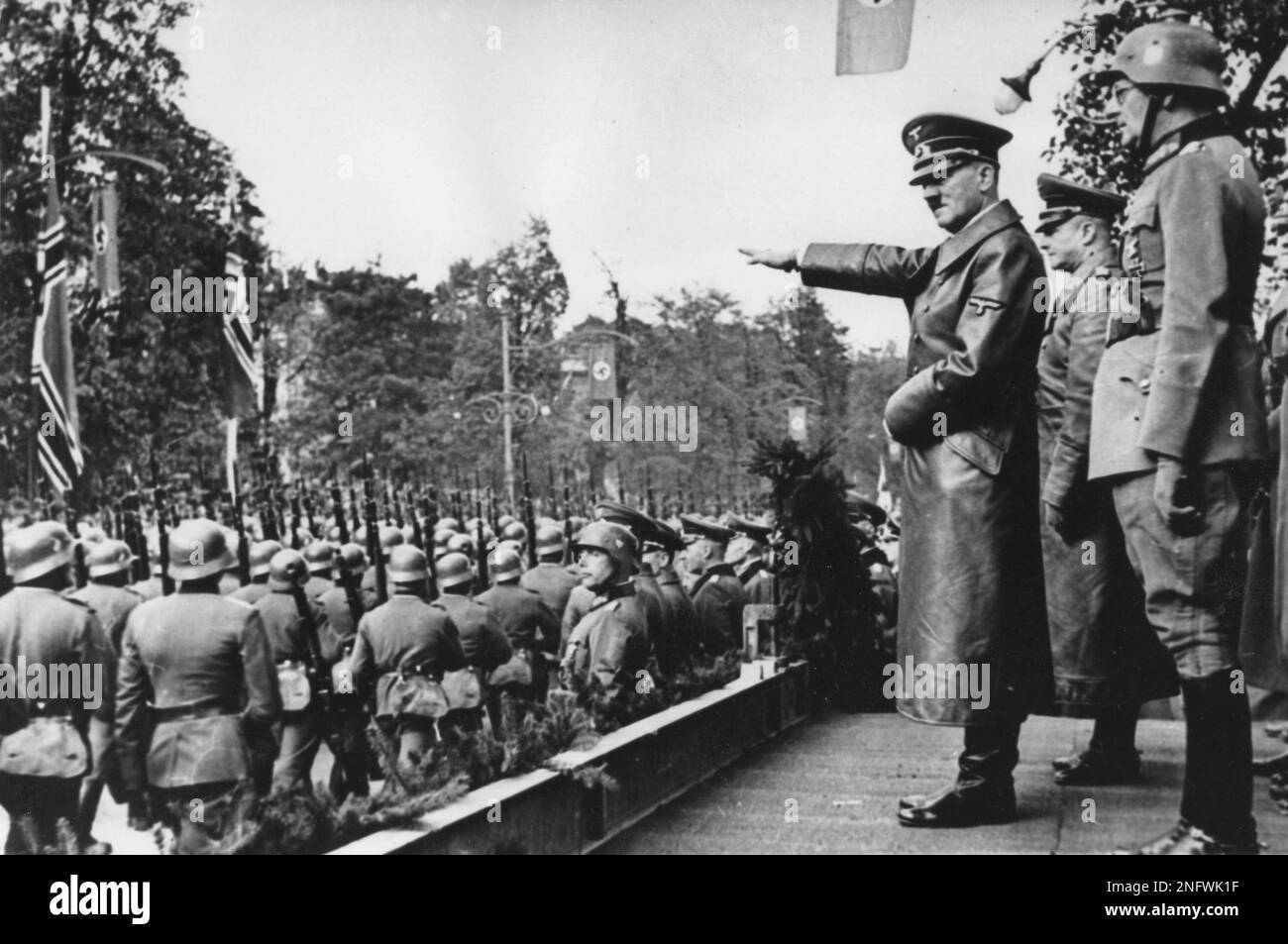 Adolf Hitler Front Salutes Parading Troops Of The German Wehrmacht In