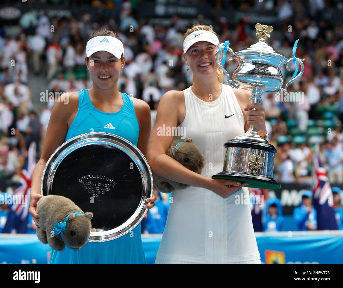 Russia's Maria Sharapova, right, and Serbia's Ana Ivanovic, left, hold ...