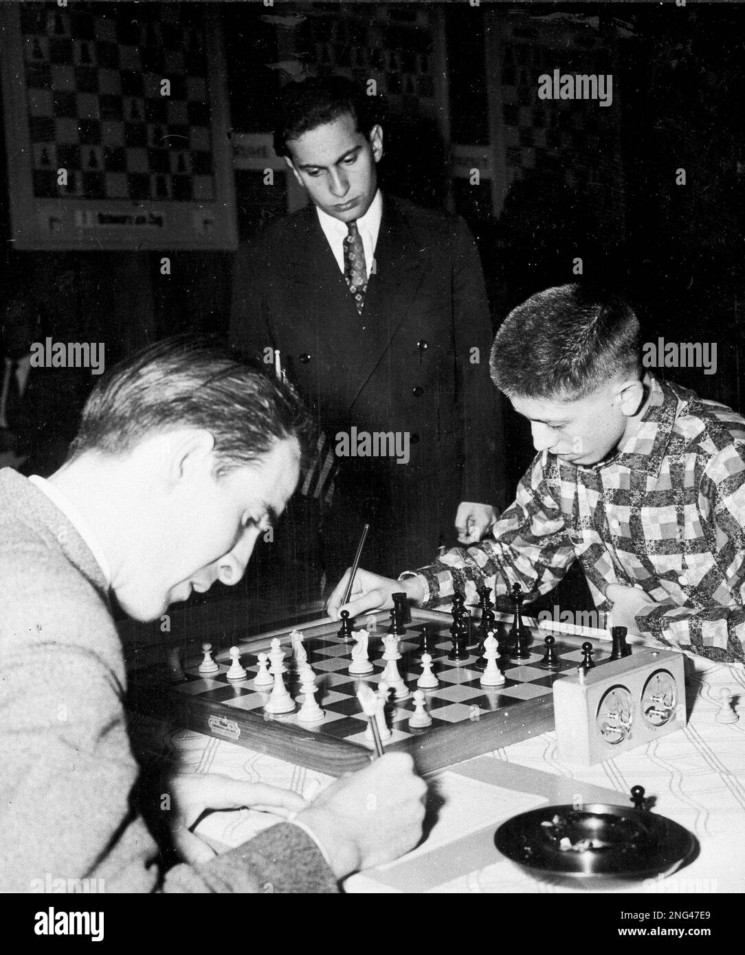 Edgar Walther, left, a member of the Swiss National Chess Team, is ...