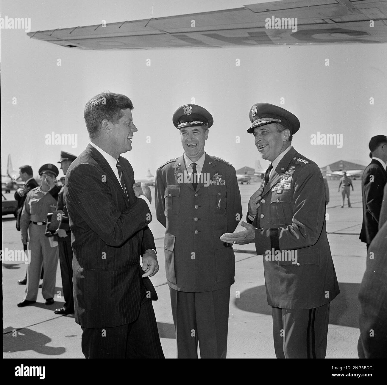 President John F. Kennedy chats with Gen. Lyman Lemnitzer of the Army ...