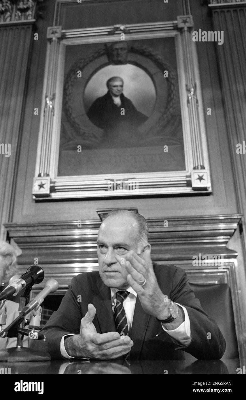 Supreme Court Justice Potter Stewart speaks to reporters at a news ...