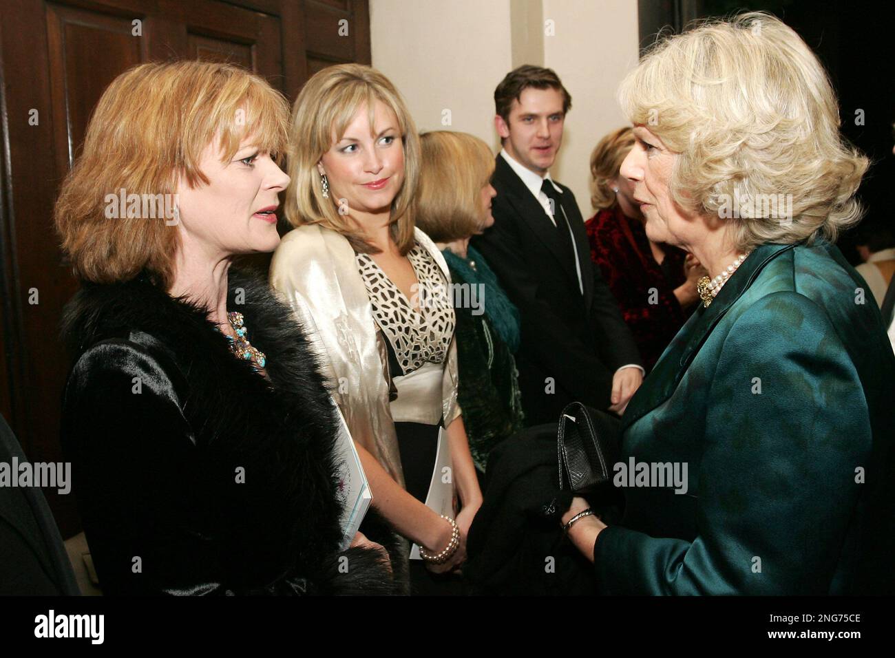 Britain's Camilla, Duchess of Cornwall, right, speaks to actress ...