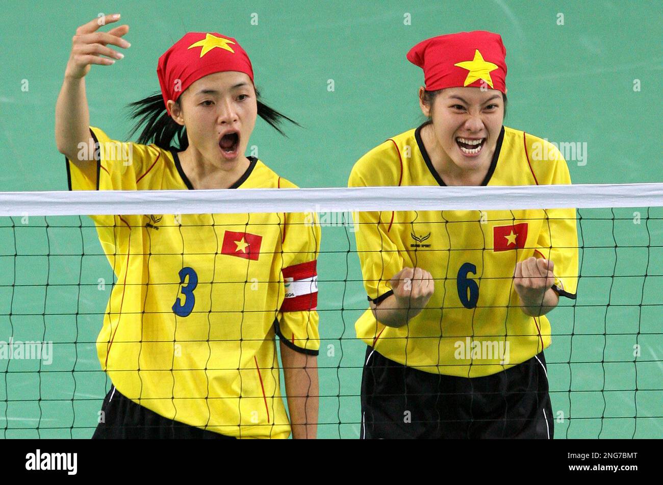 Vietnam's Luu Thi Thanh, left, and Nguyen Thi Bich Thuy celebrate after ...